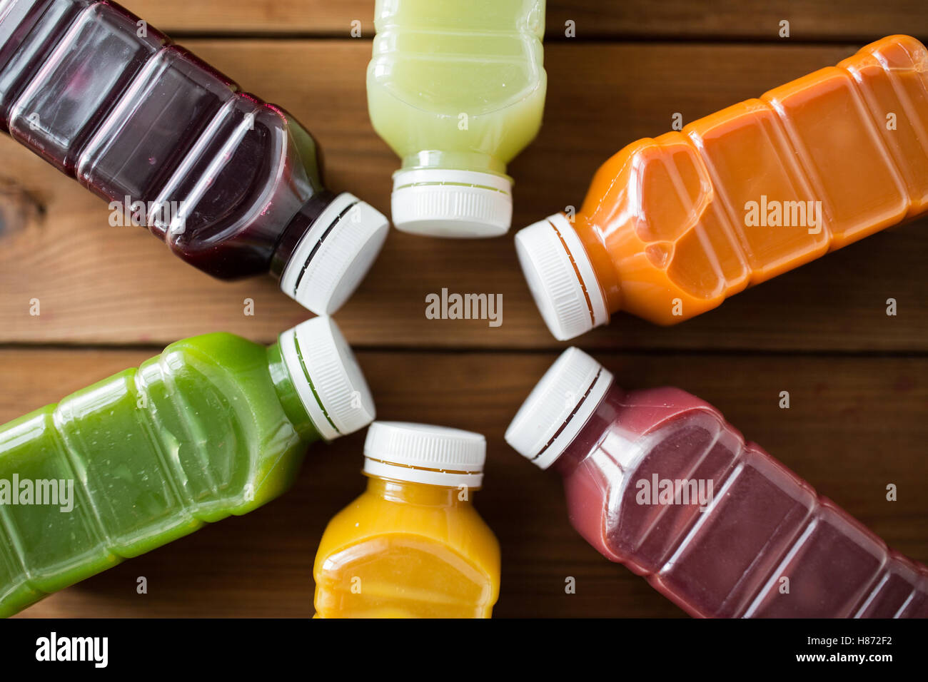 bottles with different fruit or vegetable juices Stock Photo - Alamy