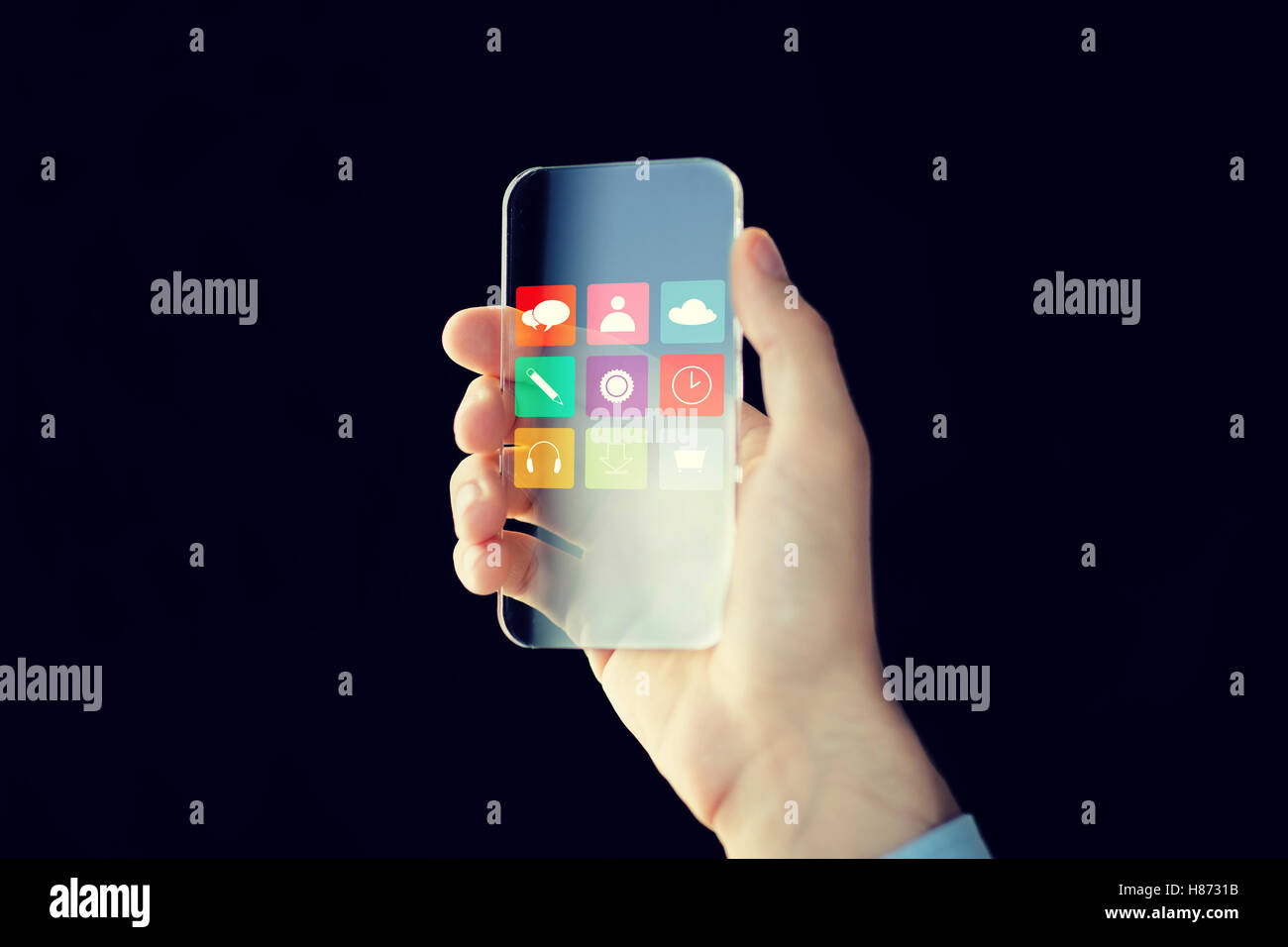 close up of male hand with transparent smartphone Stock Photo - Alamy