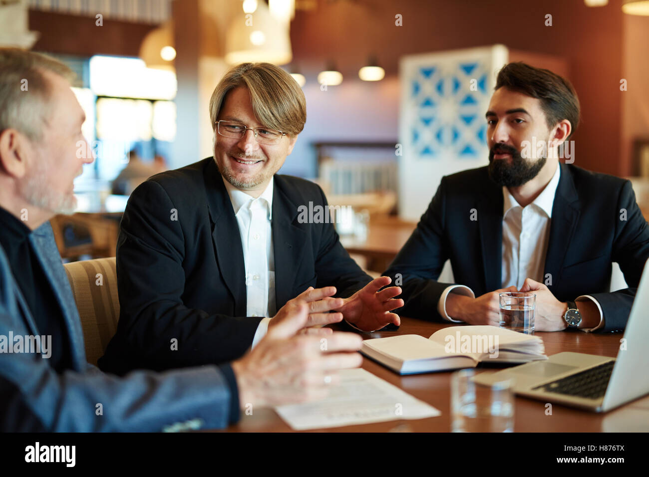 Interaction at meeting Stock Photo - Alamy