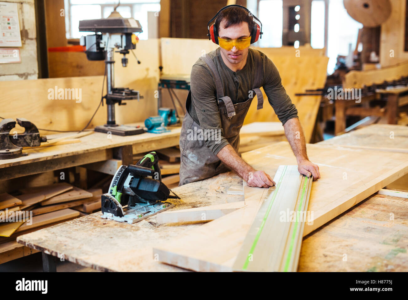 Working at cabinetmaking factory Stock Photo - Alamy