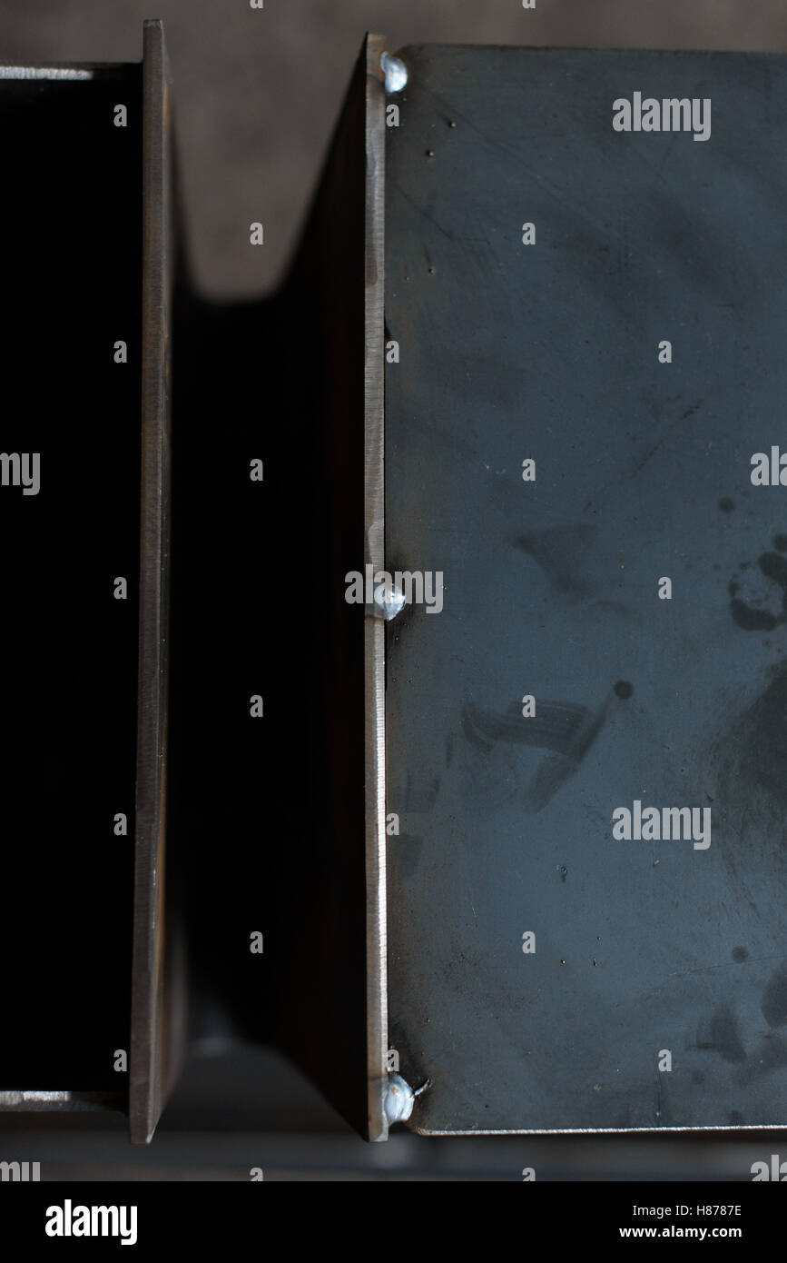 Look from above at black steel box Stock Photo - Alamy