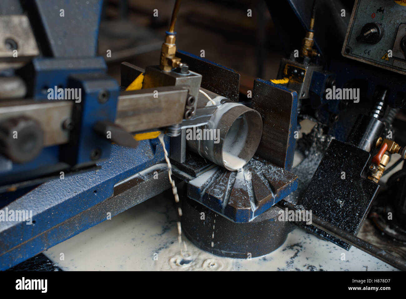 Blue circular saw cuts steel pipe Stock Photo - Alamy