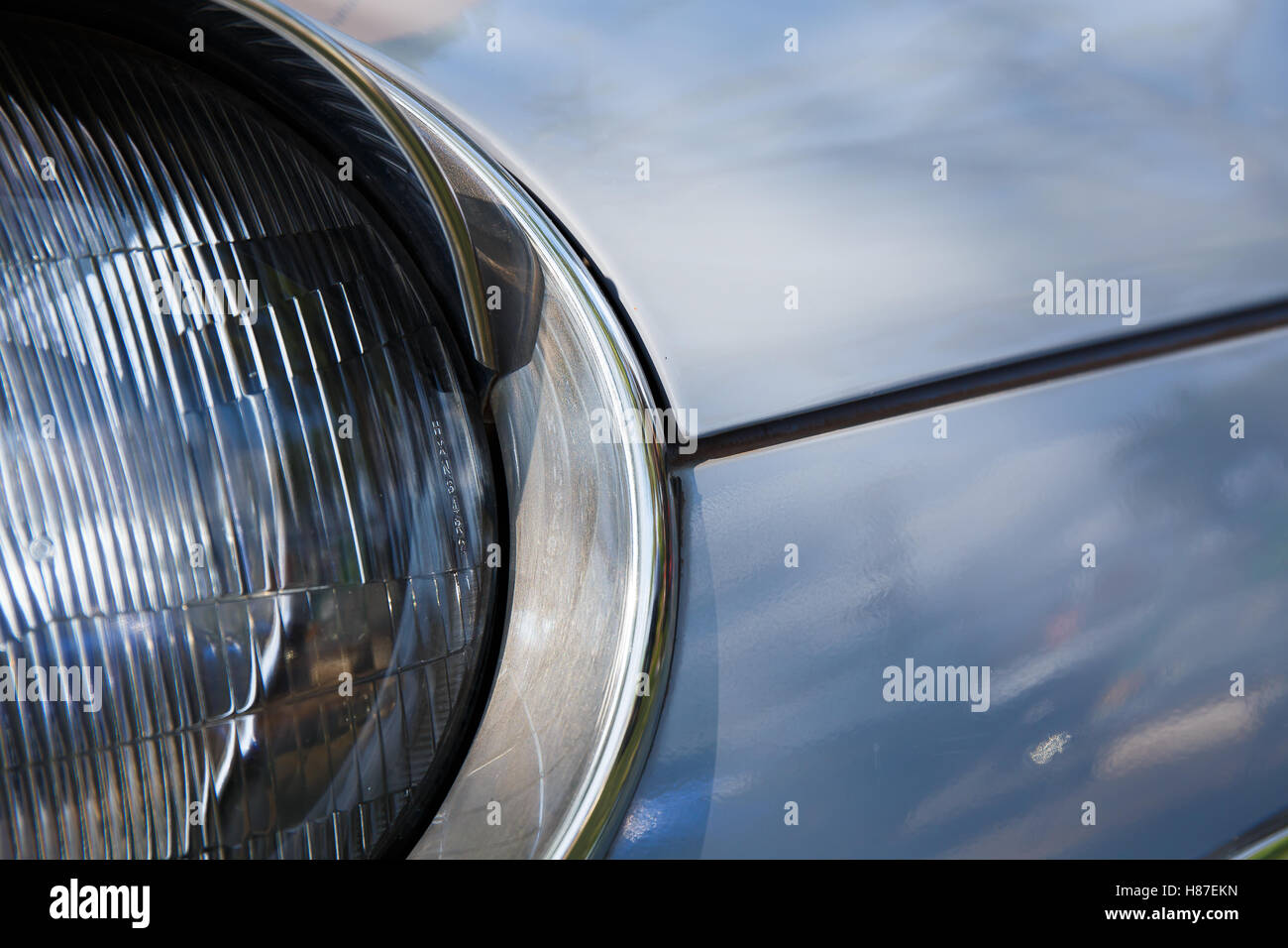 Retro styled image of a front of blue classic car Stock Photo - Alamy