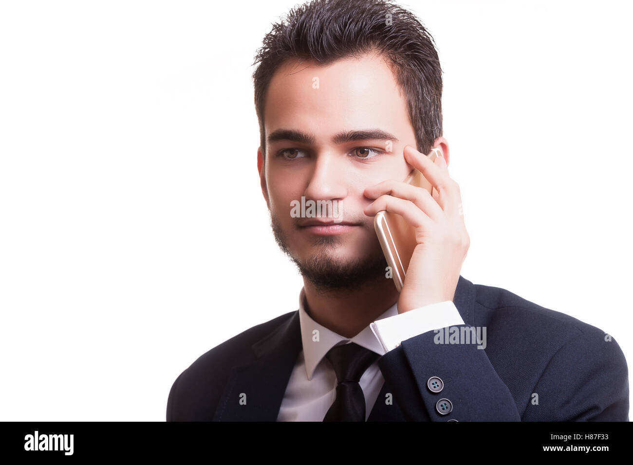 Businessman talking on the phone isolated on white background. CEO and ...