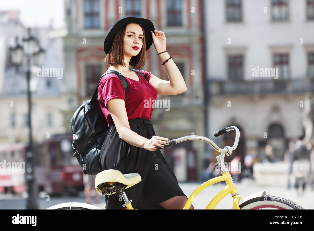 Nice girl riding a bicycle Stock Photo - Alamy
