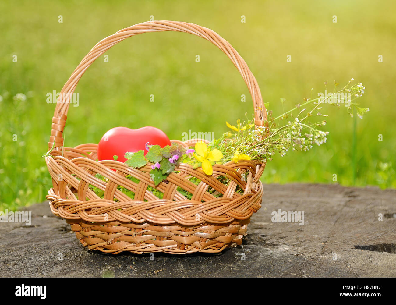 Photo of spring basket with heart shape, detail Stock Photo - Alamy