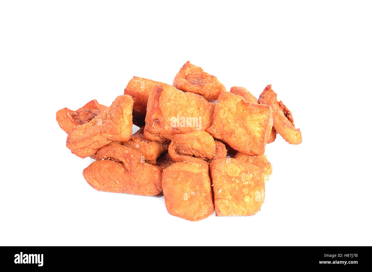 Pile of greaves isolated on white background Stock Photo - Alamy