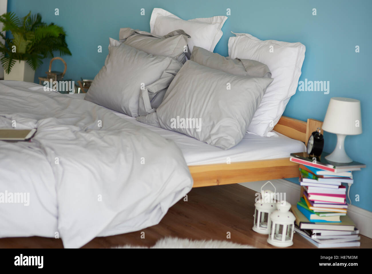 Empty bed in the bedroom Stock Photo - Alamy