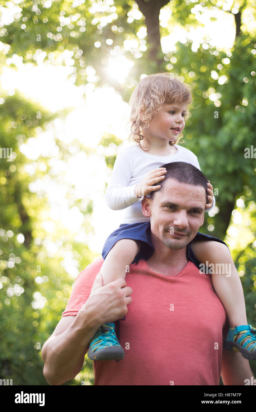 Father carrying his son hi-res stock photography and images - Alamy