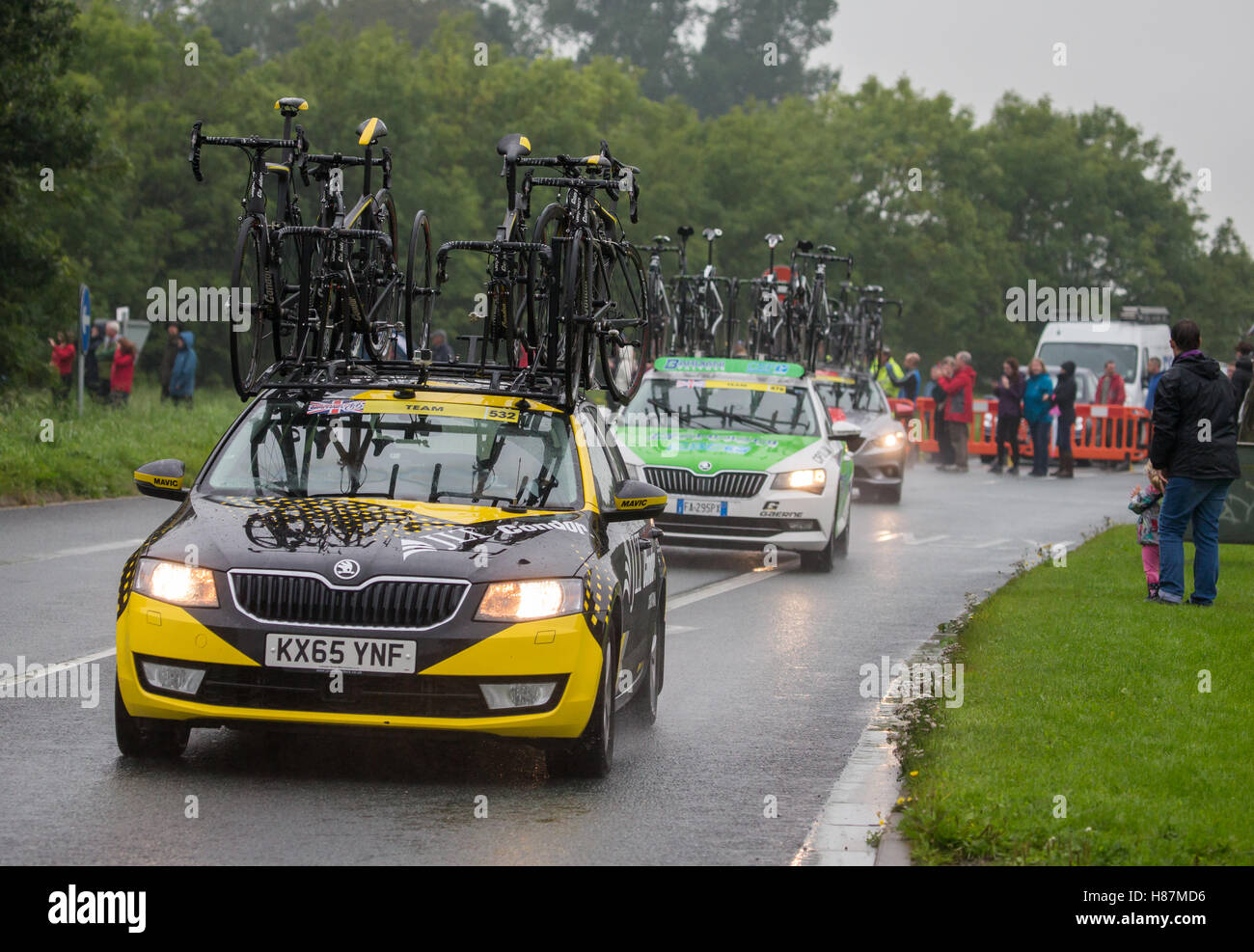 Tour of Britain Cycle Race support vehicles following the cycle race ...