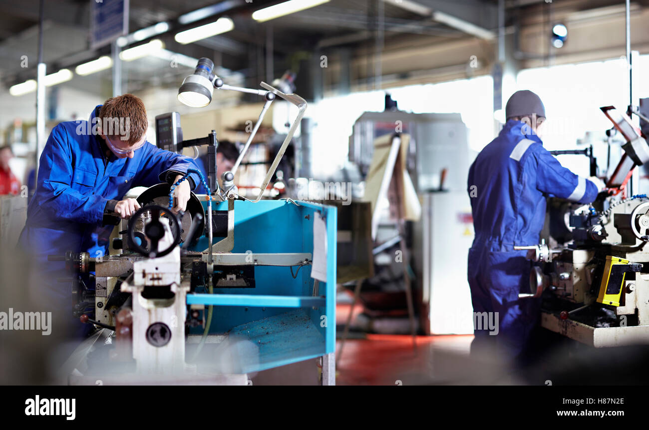 Two young Engineers working on metal Lathes. Northern Powerhouse Stock ...