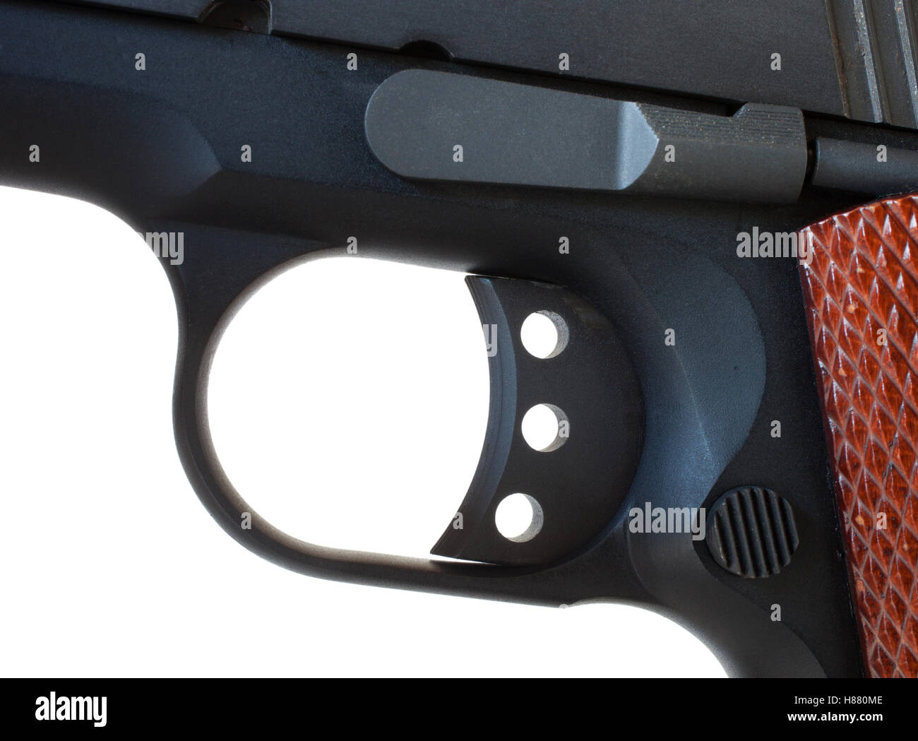 Trigger with holes and magazine release on a semi auto handgun Stock ...