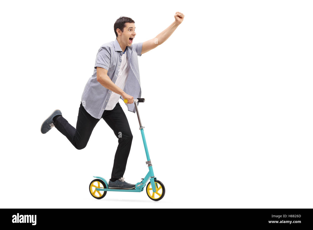 Full length portrait of happy guy riding a scooter isolated on white ...