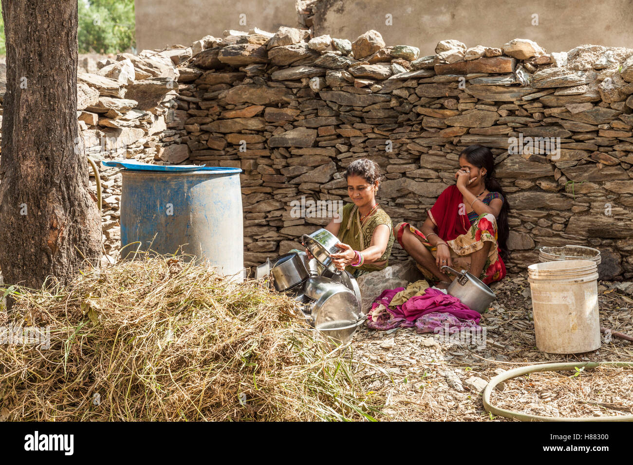 Indian women outside house in hi-res stock photography and images - Alamy