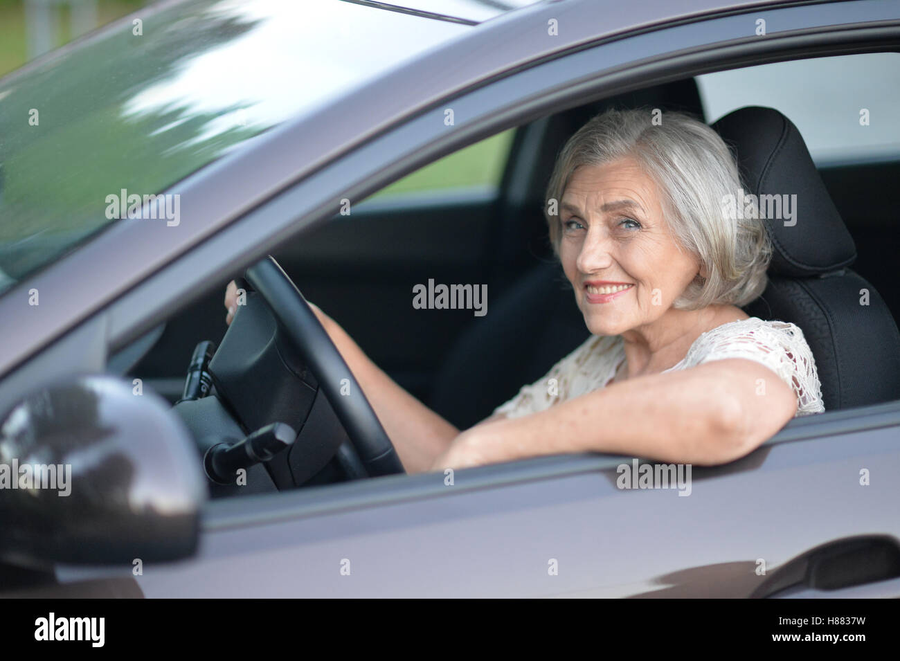 Senior Woman Driving Car Stock Photo - Alamy