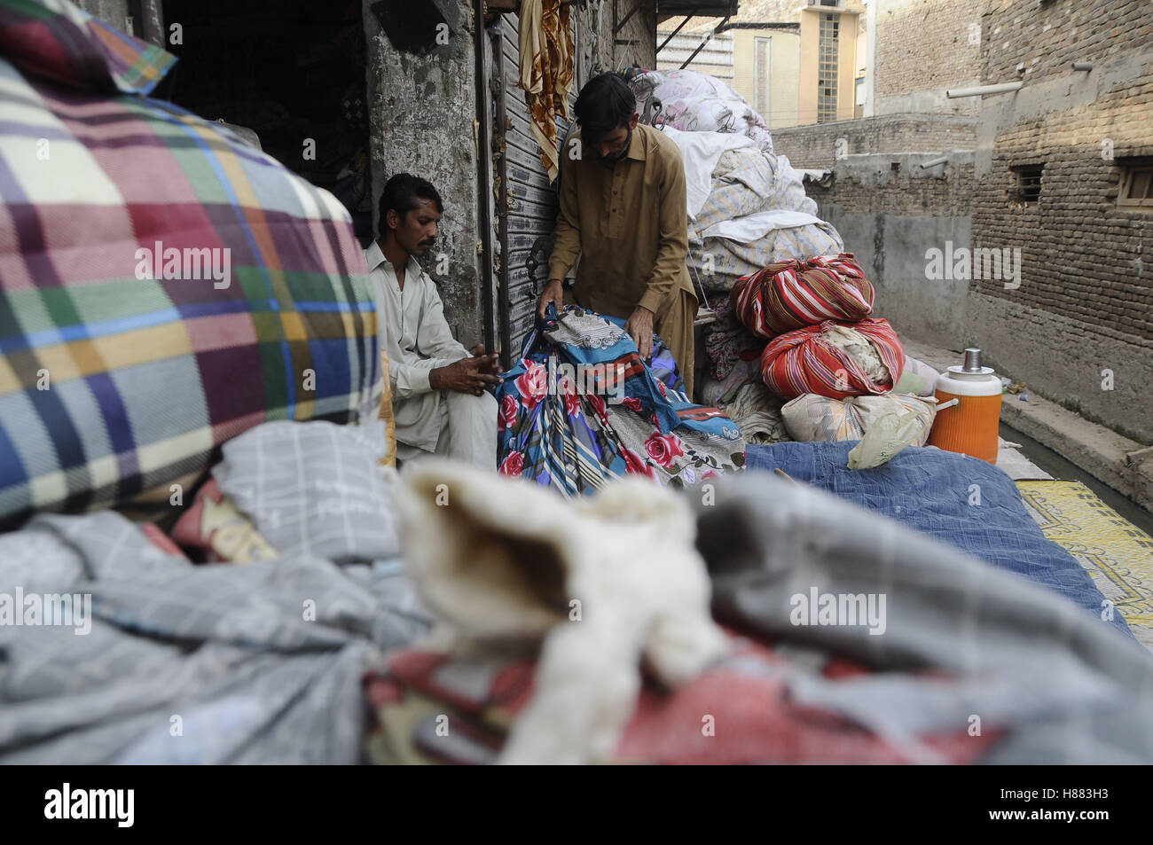 Rawalpindi, Pakistan. 09th Nov, 2016. A wool worker is seen at wool ...