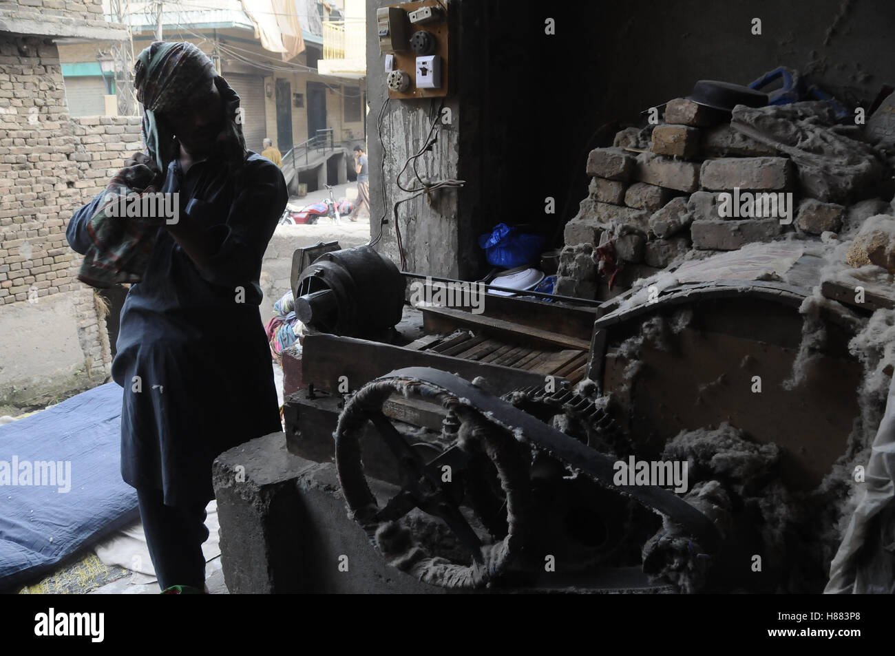Rawalpindi, Pakistan. 09th Nov, 2016. A wool worker is seen at wool ...