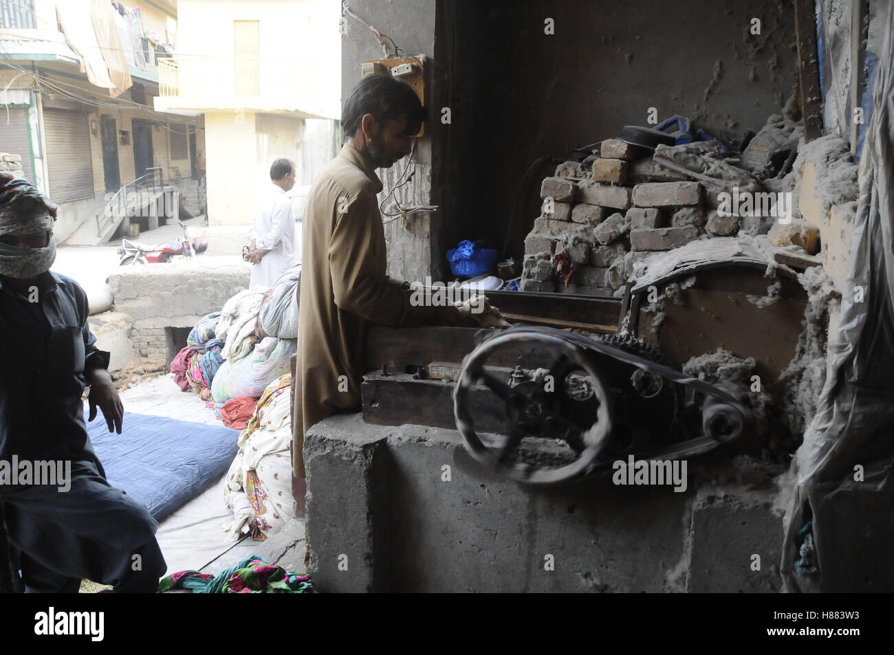 Rawalpindi, Pakistan. 09th Nov, 2016. A wool worker is seen at wool ...