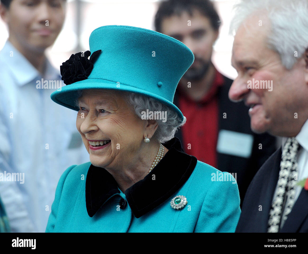 Queen Elizabeth II, stands with Sir Paul Nurse, director of the Francis ...