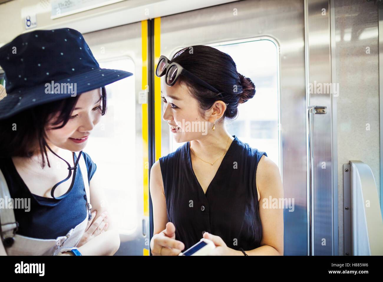 Young japanese women on train hi-res stock photography and images - Alamy