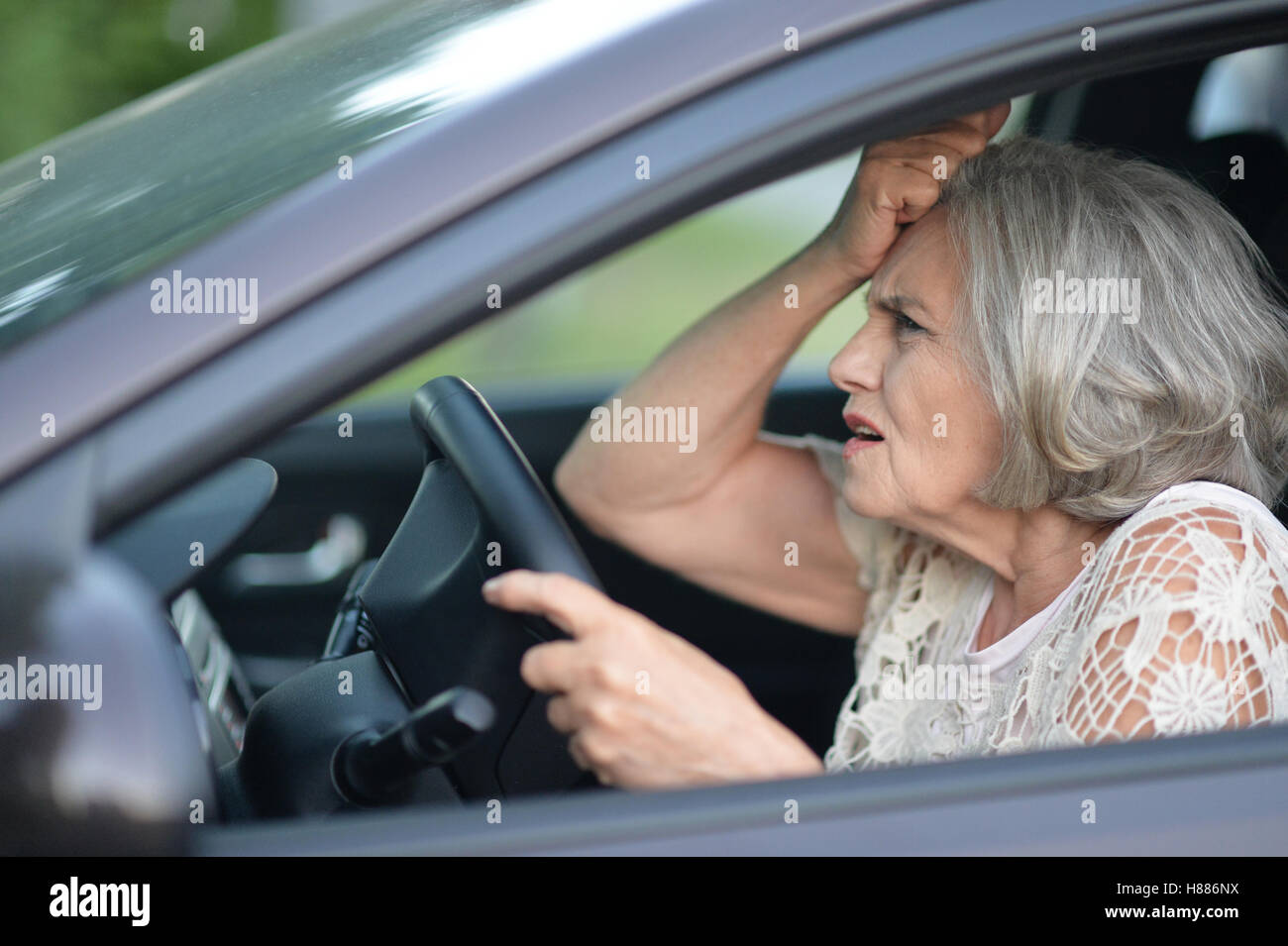 senior woman driving car Stock Photo - Alamy