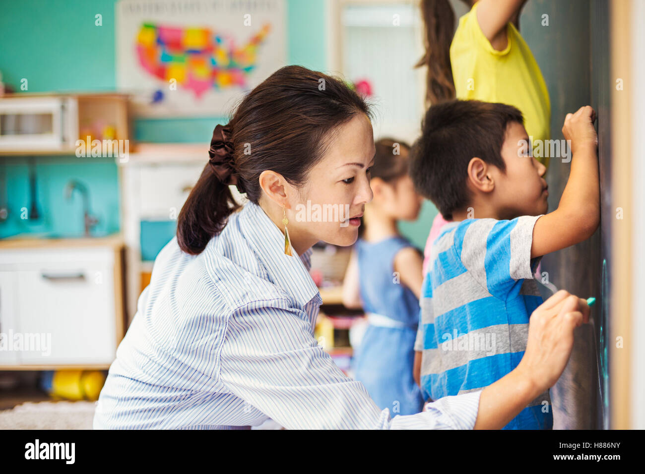 Asian woman thinking writing hi-res stock photography and images - Alamy