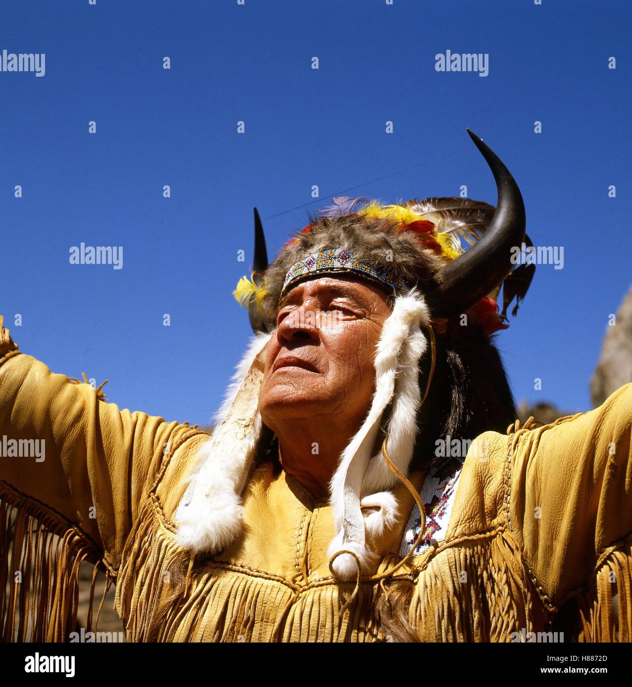 Native American with Arms Raised Stock Photo - Alamy