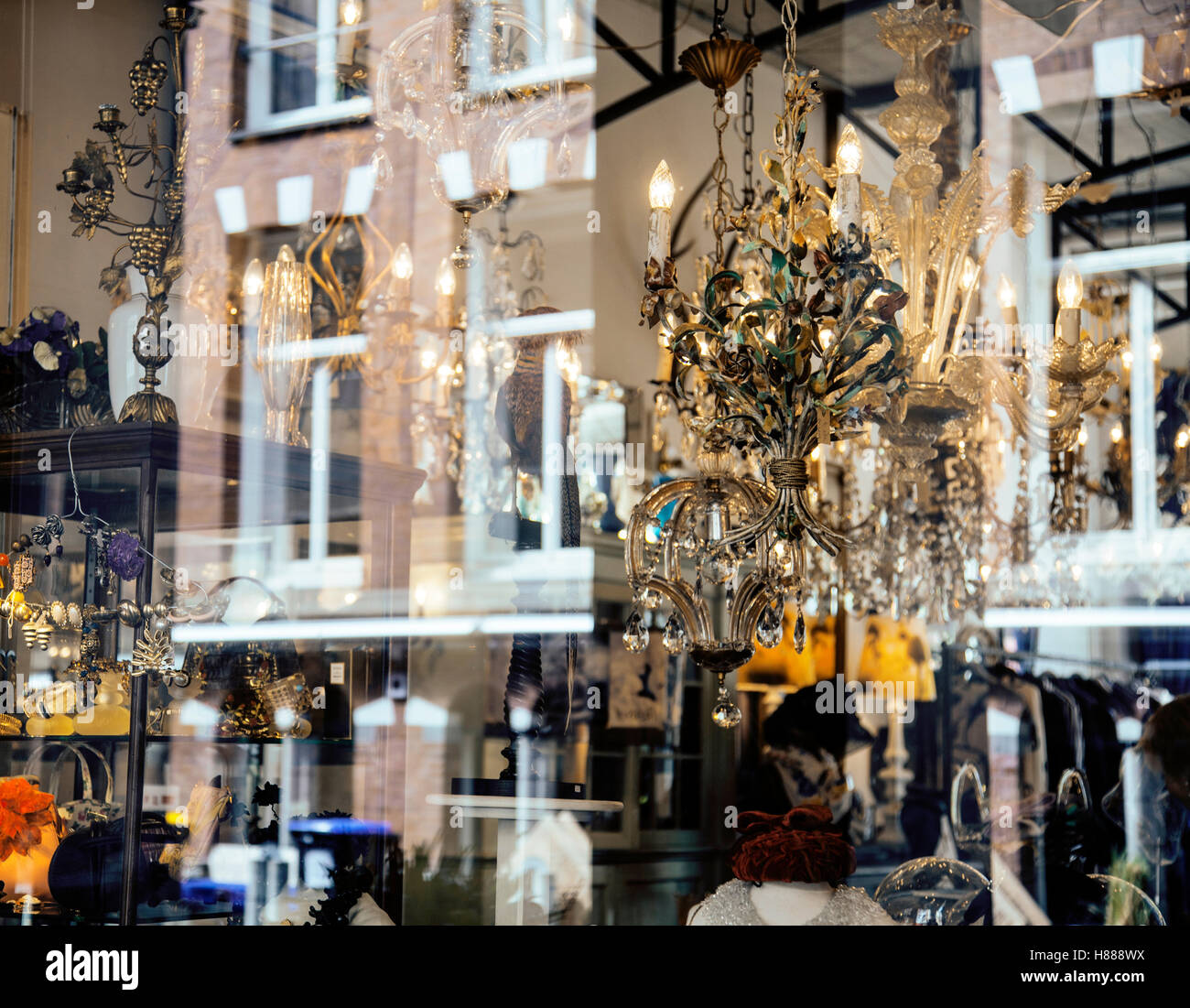 old vintage storefront with lot of antique stuff, city life conc Stock ...