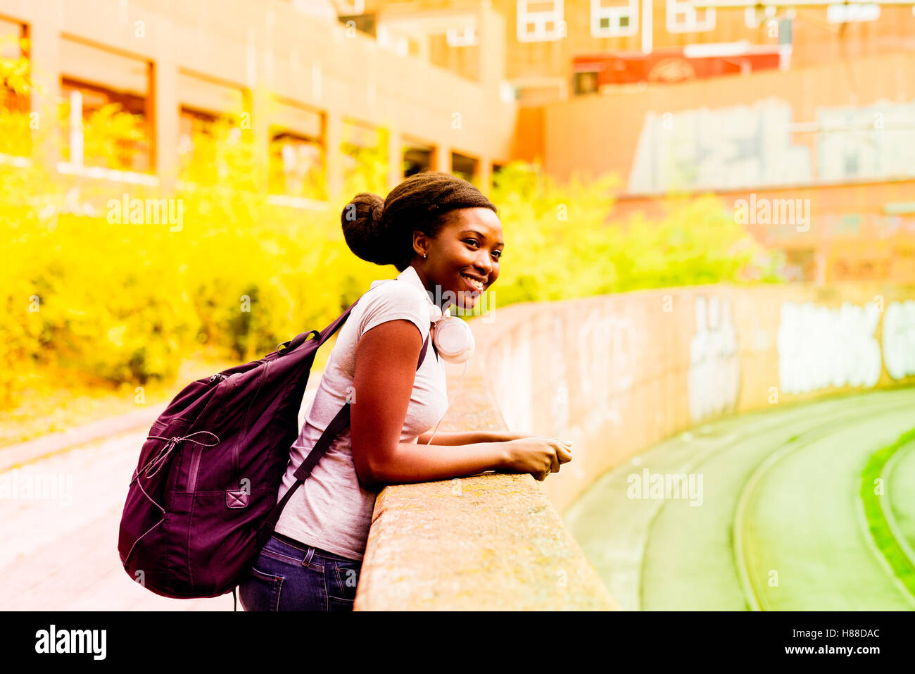 Wearing black rucksack hi-res stock photography and images - Alamy