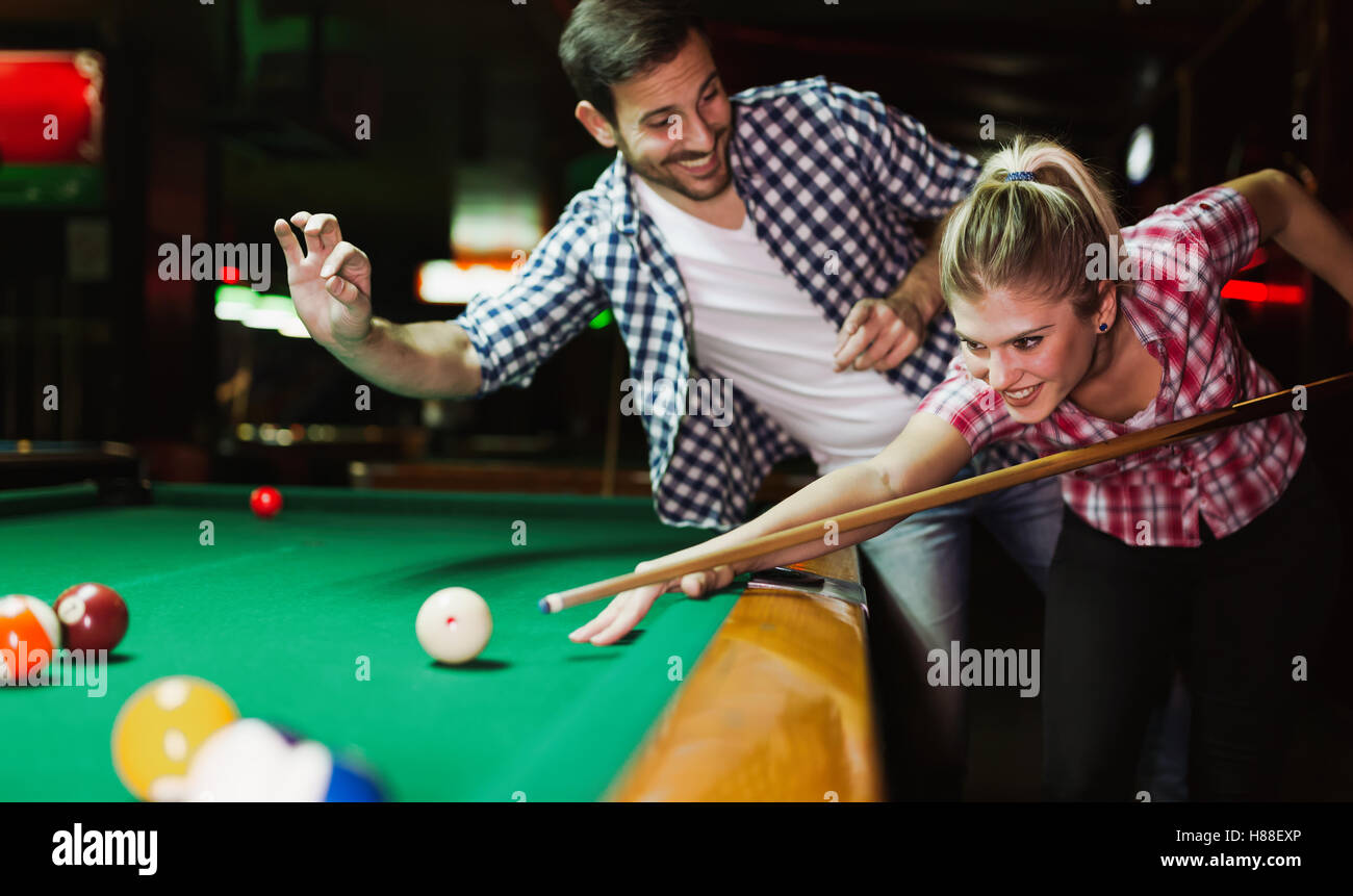 Couple playing snooker together Stock Photo - Alamy
