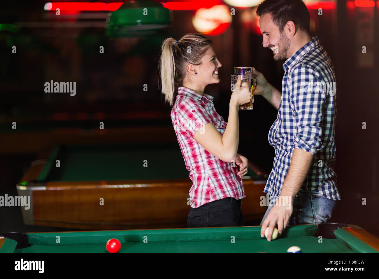 Smiling man drinking beer hi-res stock photography and images - Alamy