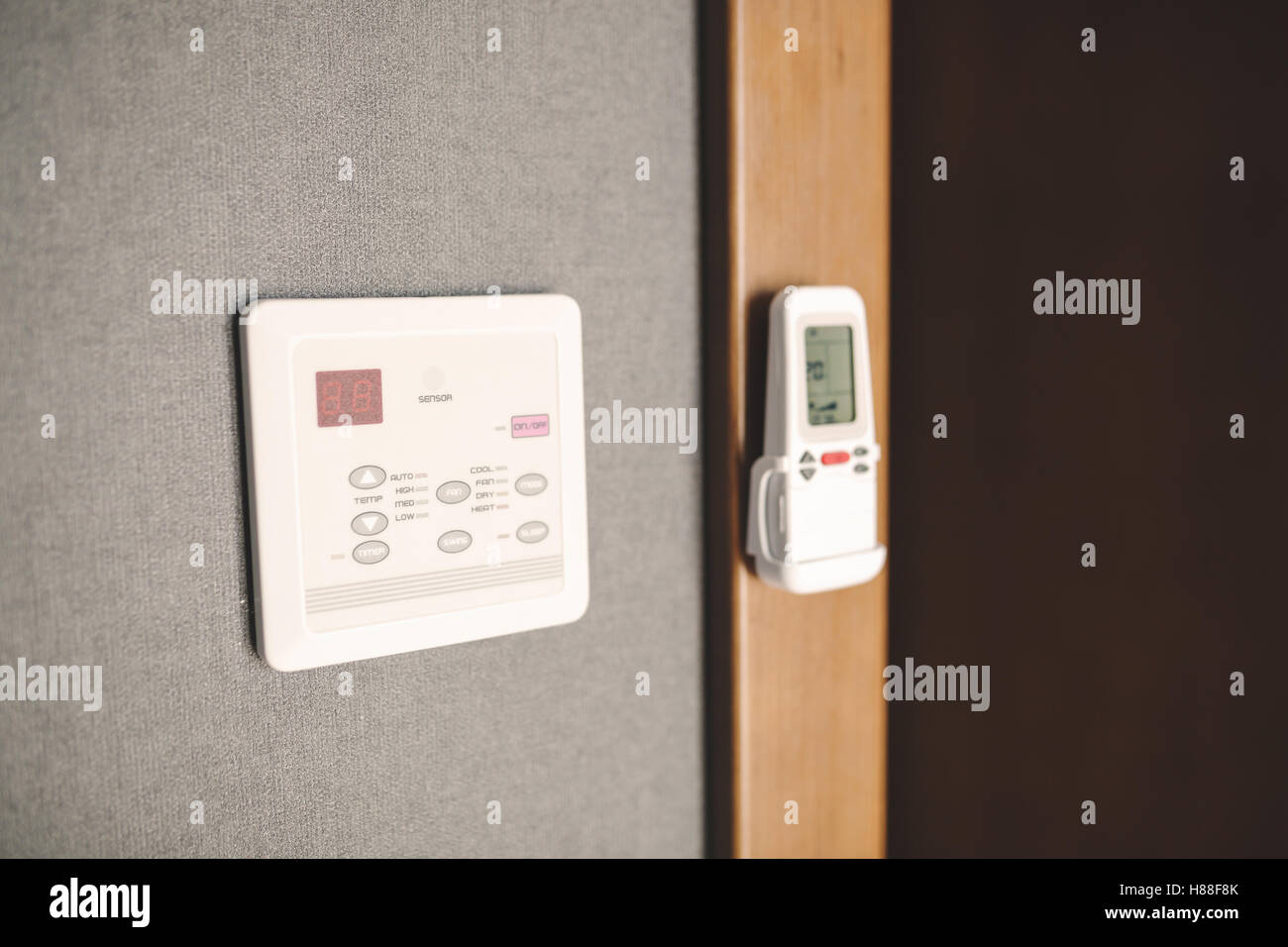 Setting the room temperature hi-res stock photography and images - Alamy