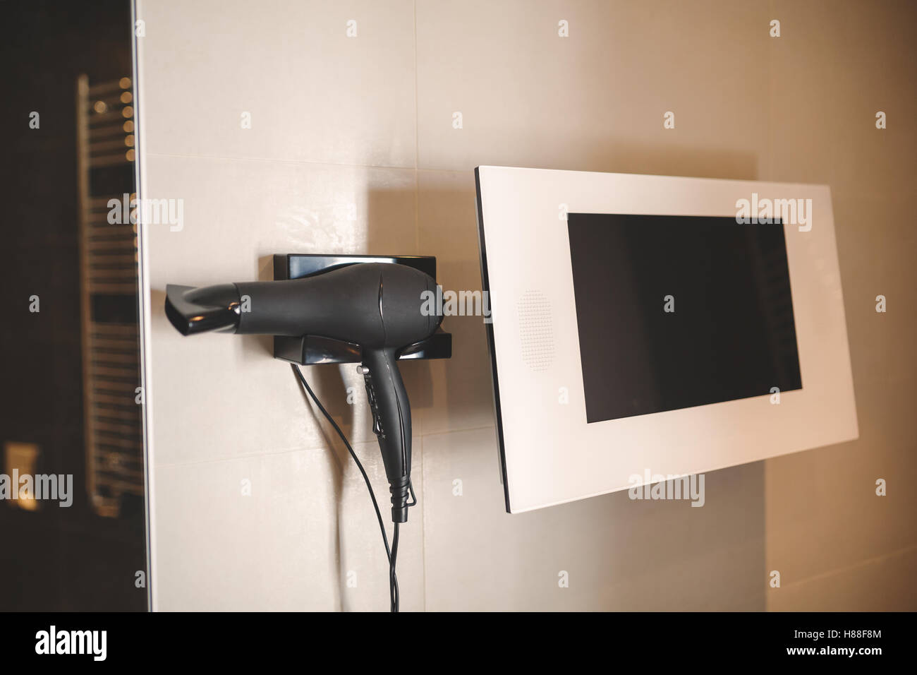 Monitor tv in bathroom is modern equipment Stock Photo - Alamy