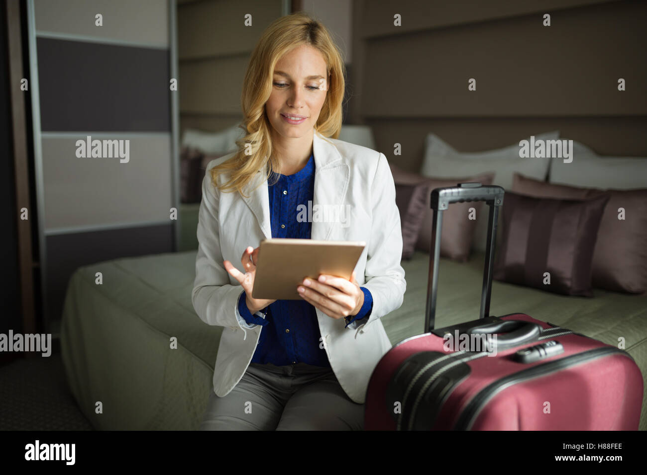 Businesswoman on her business trip traveling to destination Stock Photo ...