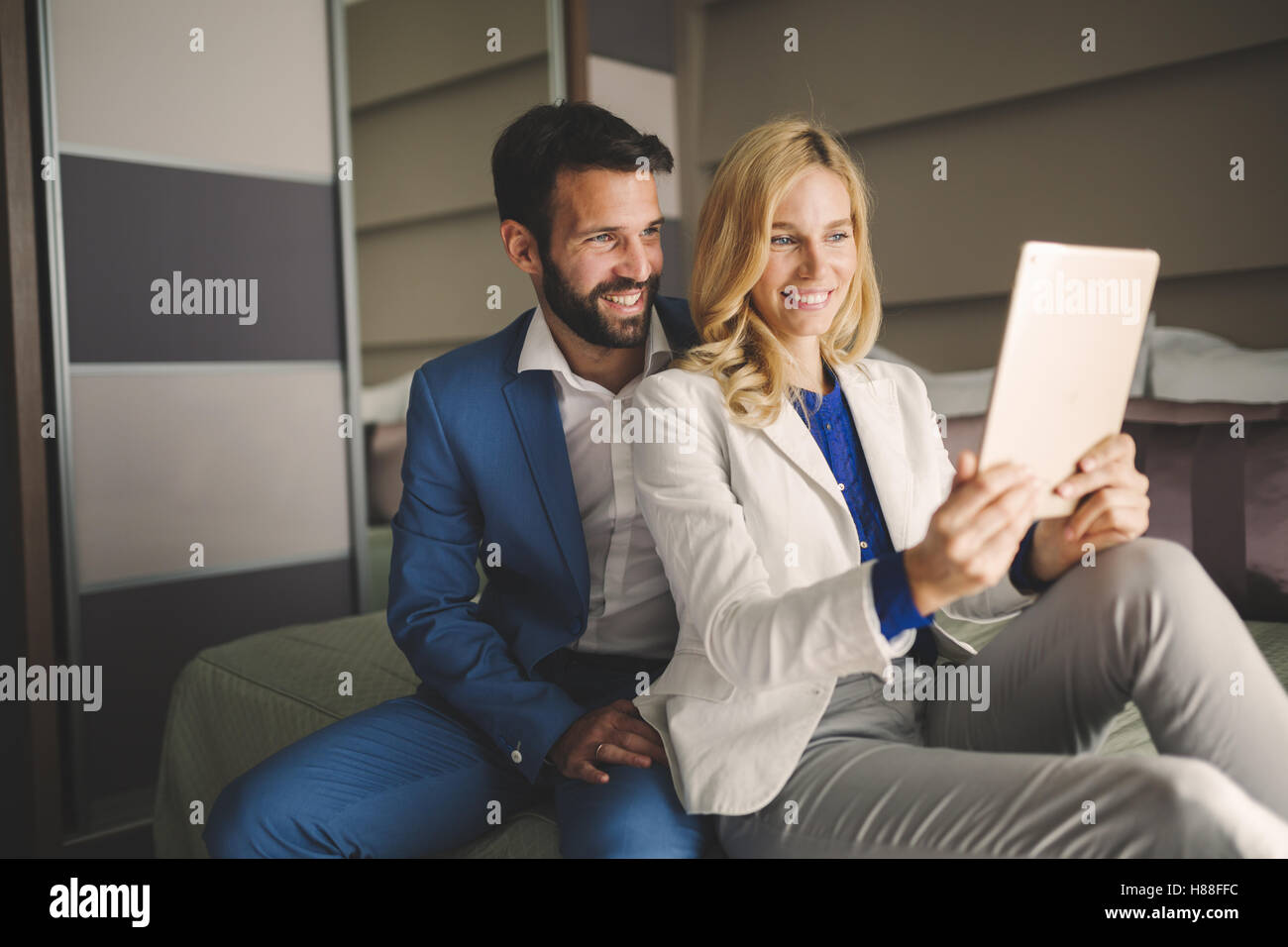 Business colleagues taking selfie on business trip Stock Photo - Alamy