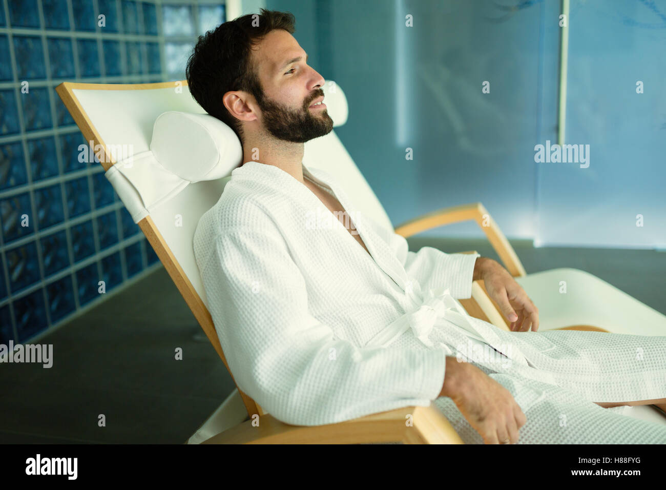 Handsome man relaxing enjoying spa treatment Stock Photo - Alamy