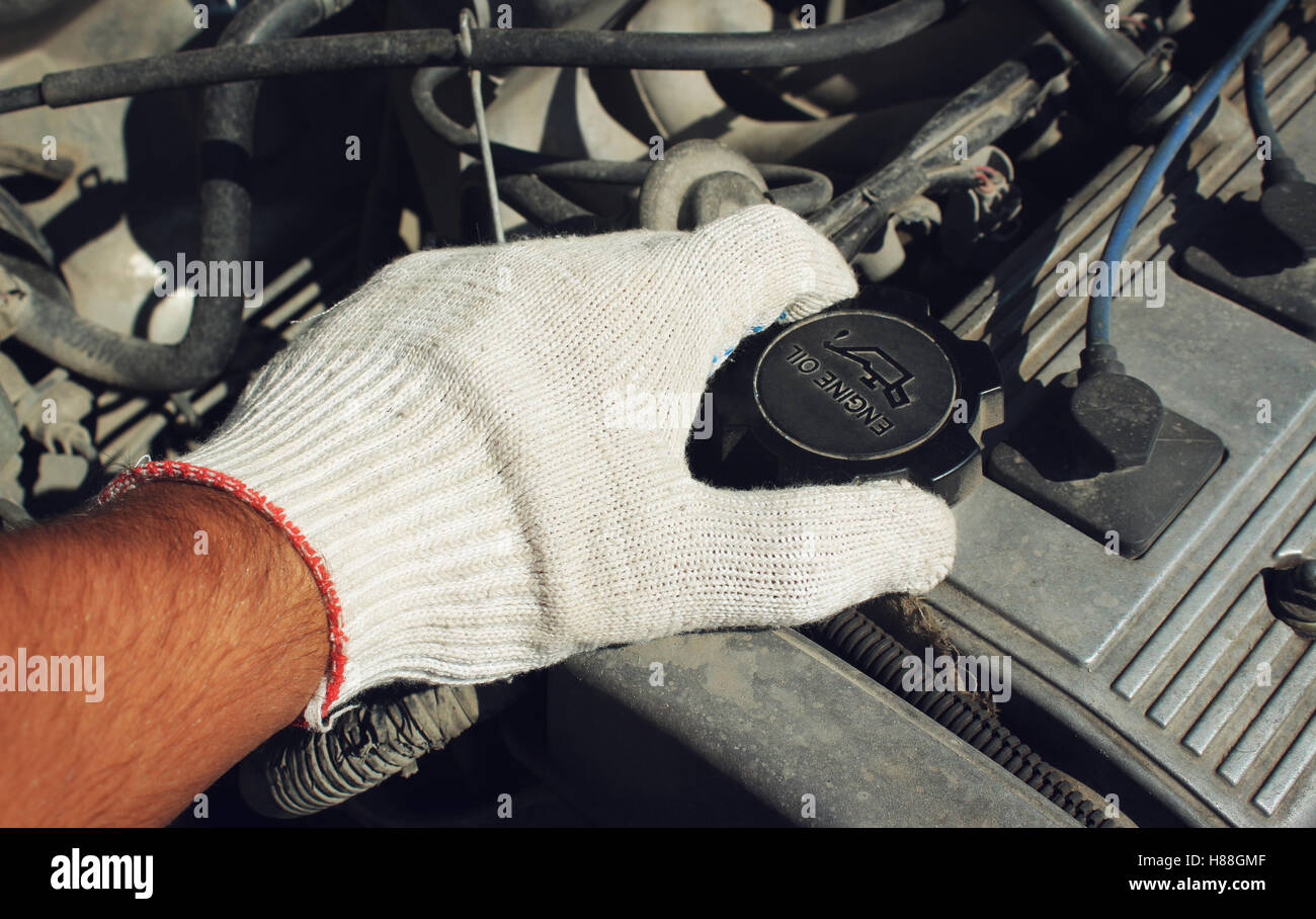 The cover oil filler neck of the car in a hand Stock Photo - Alamy
