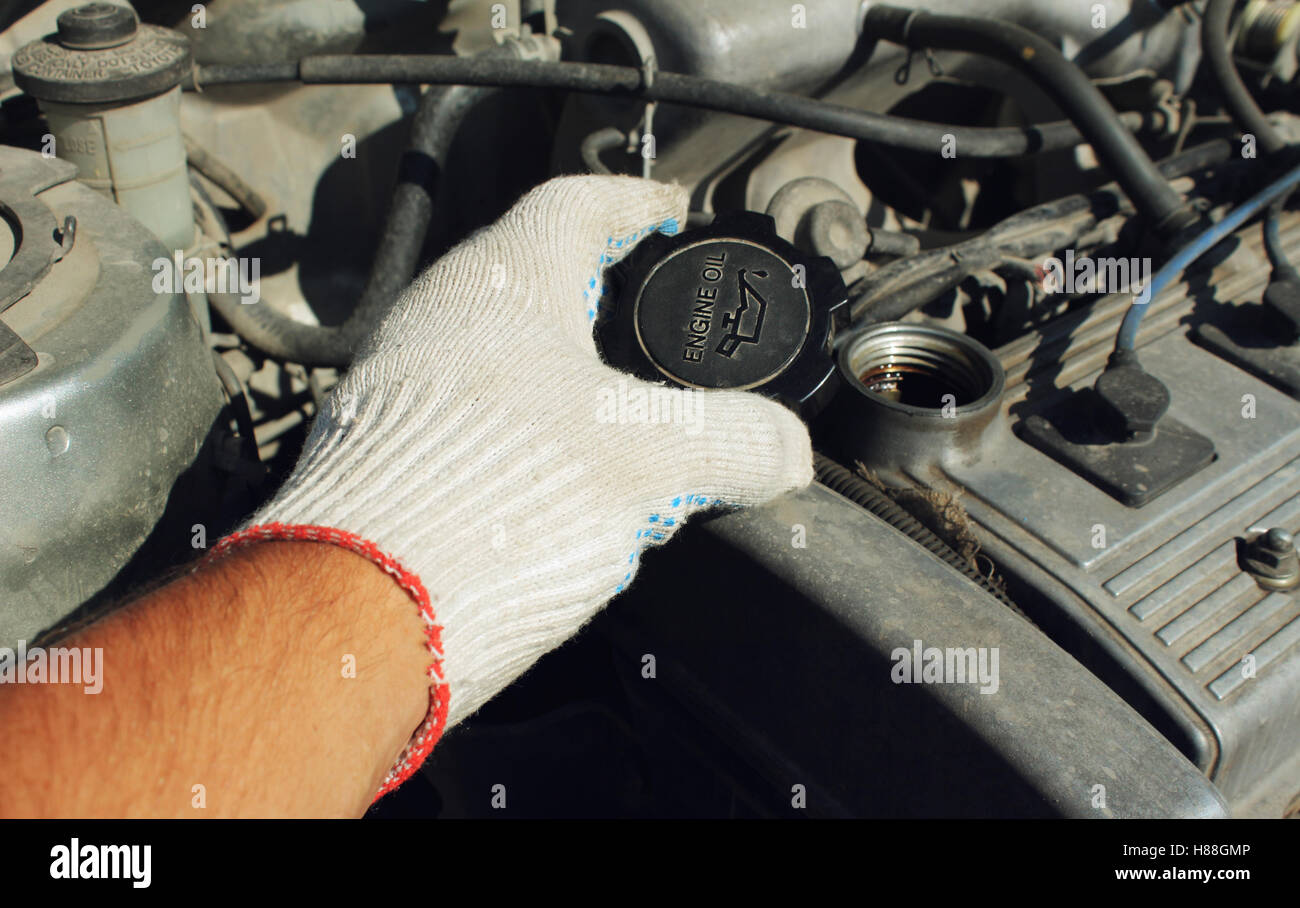 The cover oil filler neck of the car in a hand Stock Photo - Alamy
