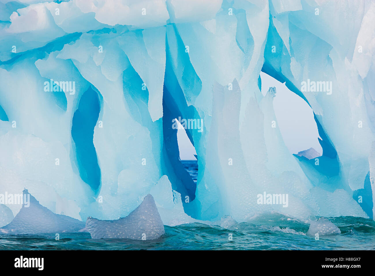 Blue iceberg eroded by waves, Svalbard, Norway Stock Photo - Alamy