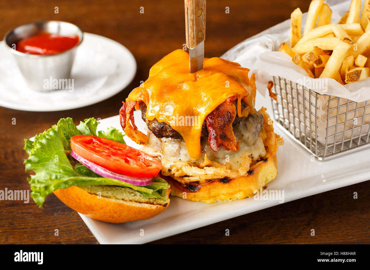 Open Face Cheeseburger with Fries Stock Photo - Alamy