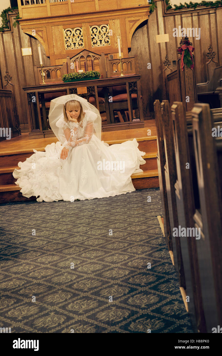 Bride left at the alter Stock Photo - Alamy