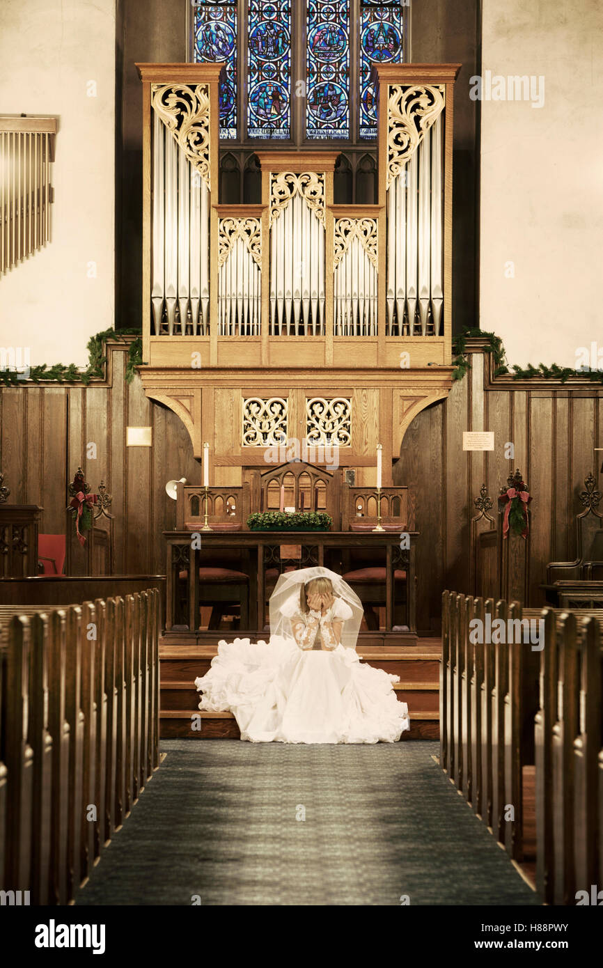 Bride left at the alter Stock Photo - Alamy