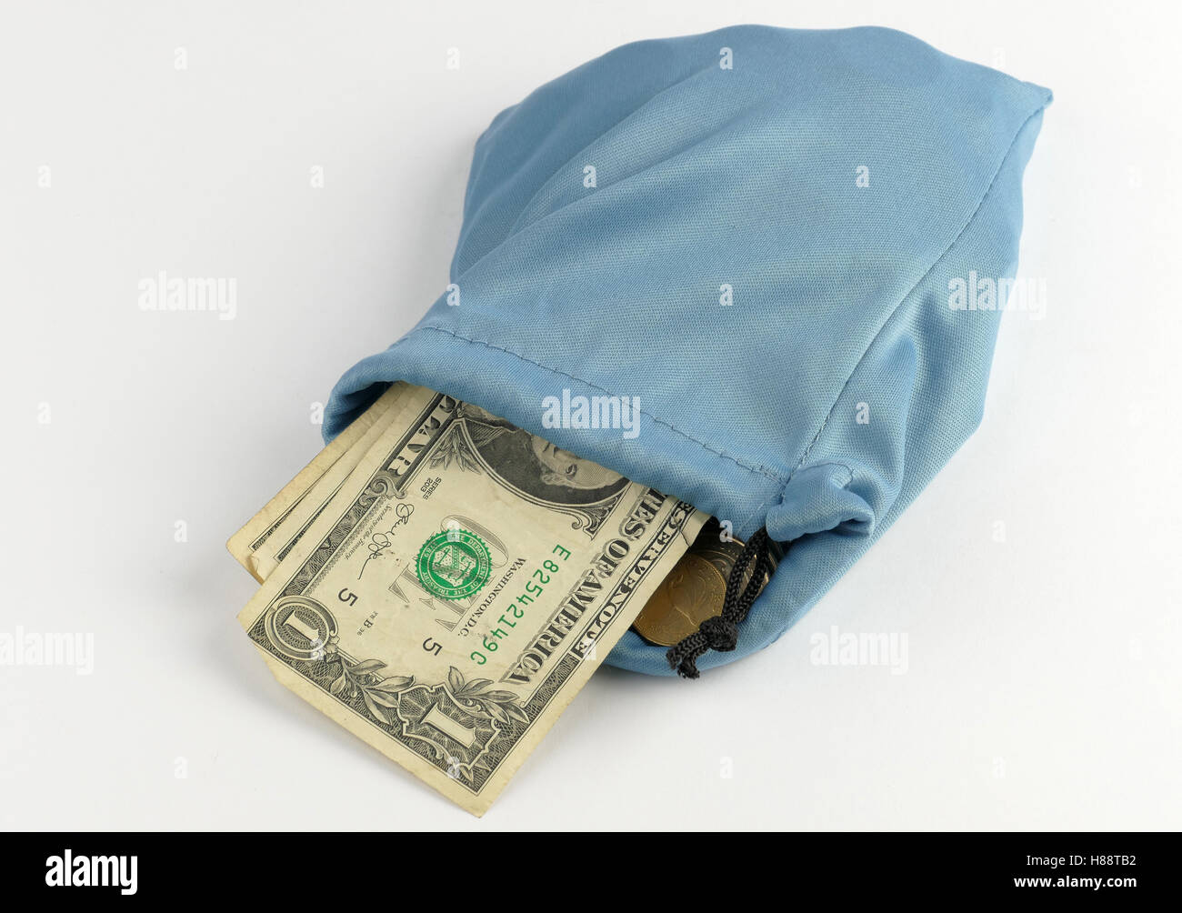 Money in a bag isolated Stock Photo - Alamy