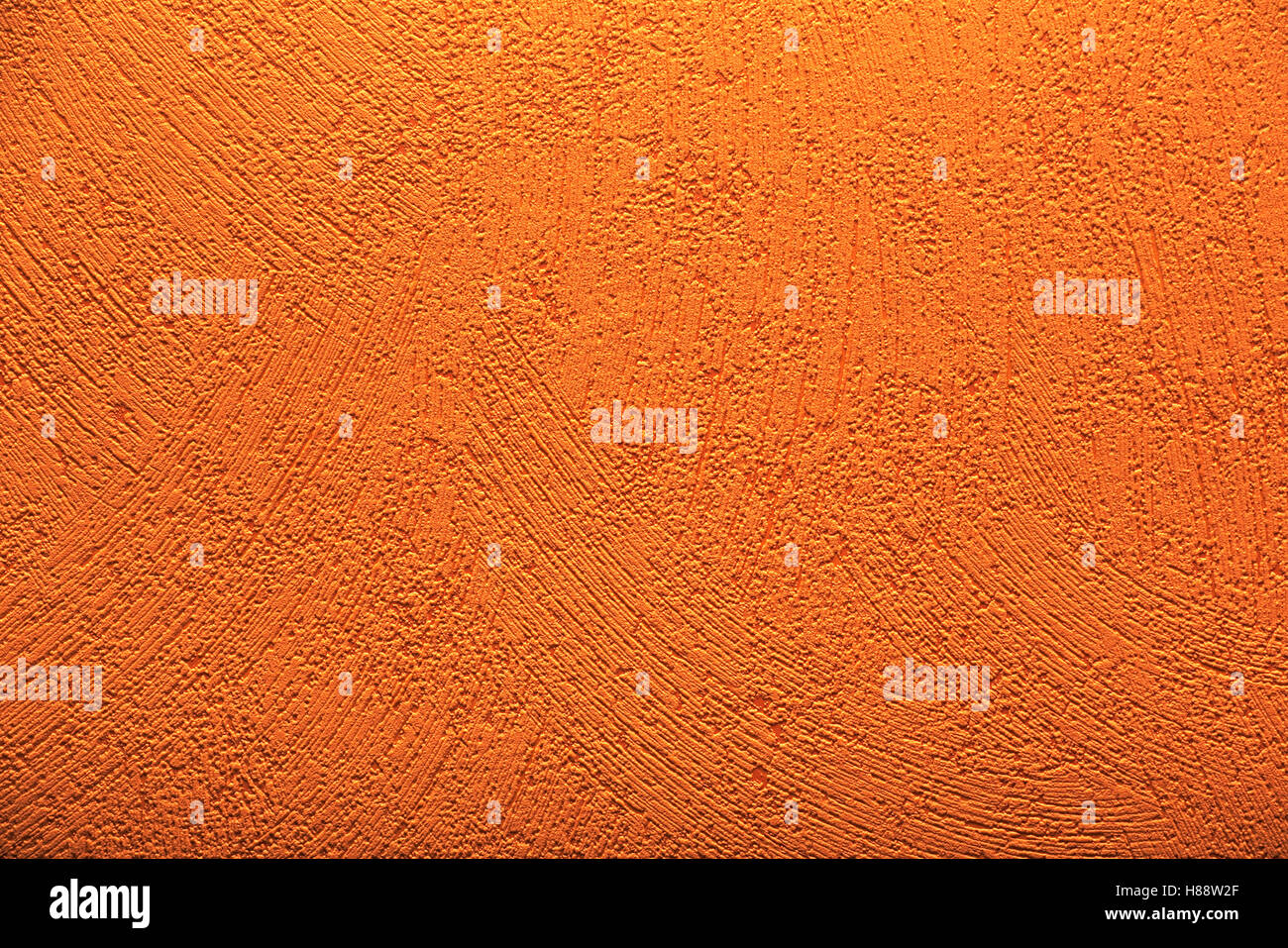 Conceptual shot of orange wallpaper with paint structure Stock Photo ...