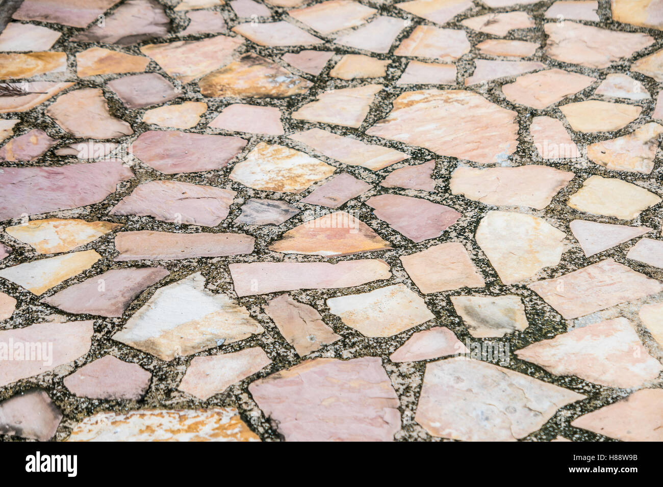 Granite gray flagstone pavement wall background Stock Photo - Alamy