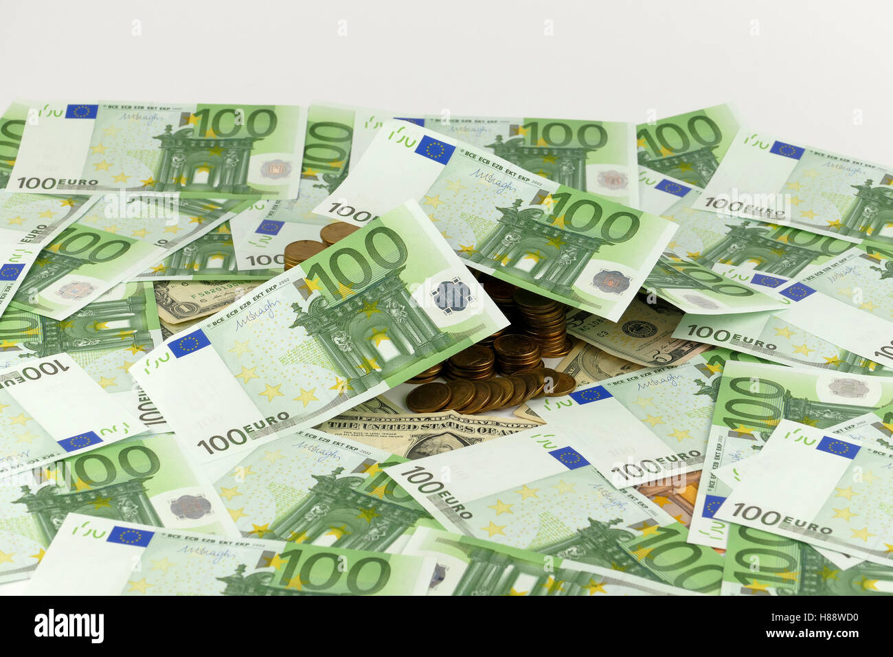 Banknotes and coins isolated on white background Stock Photo - Alamy