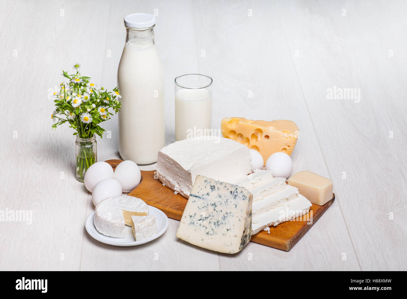 milk and food on wooden background Stock Photo - Alamy