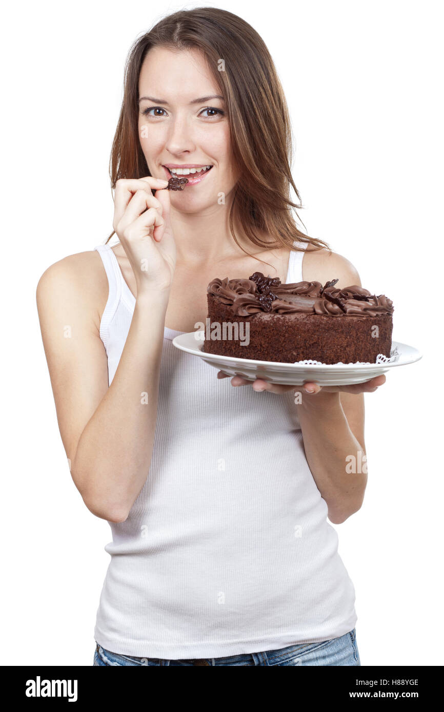 beautiful brunette woman eating chocolate cake Stock Photo - Alamy