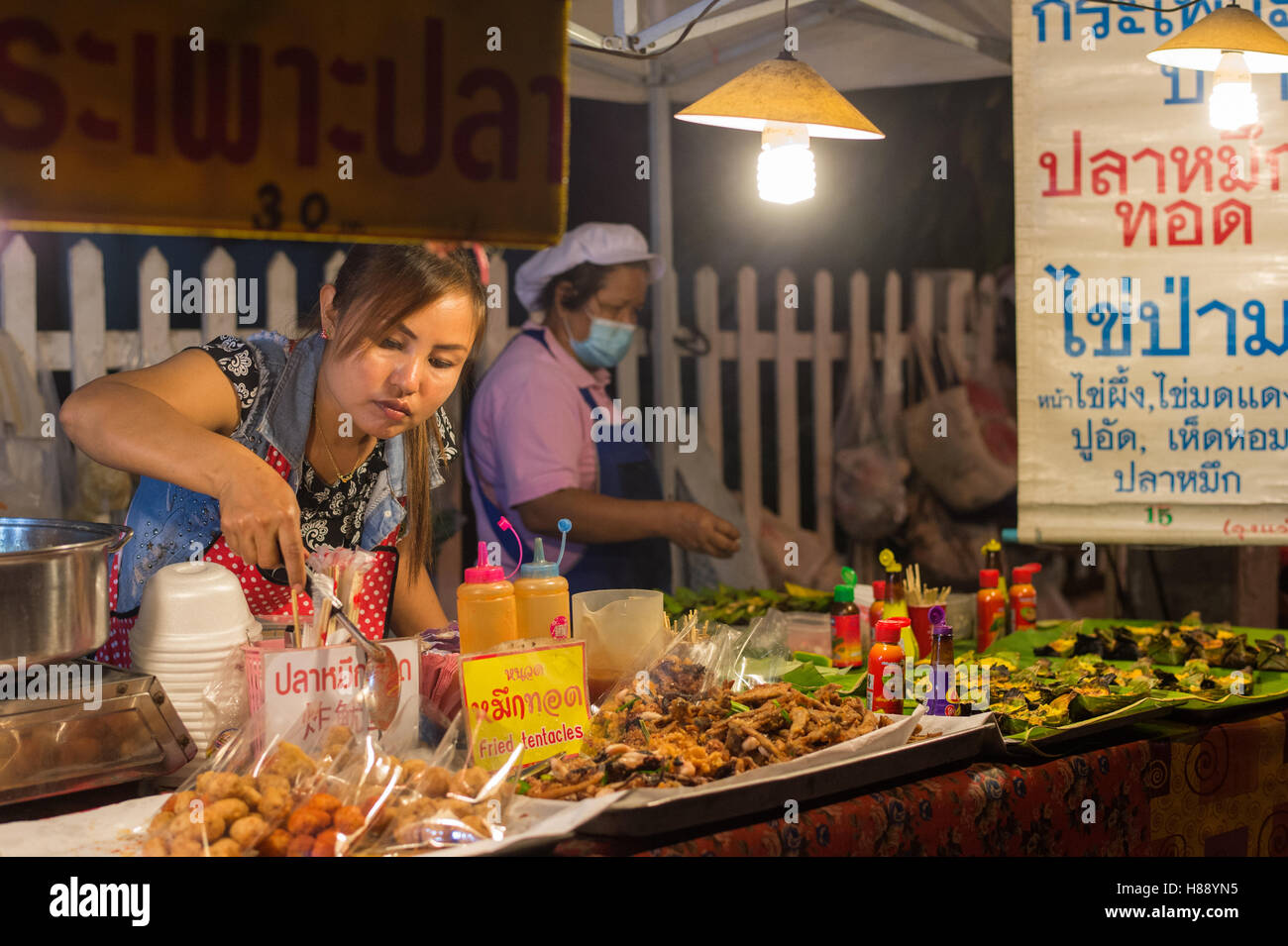 Sunday night market walking street in Chiang Mai, Thailand Stock Photo ...