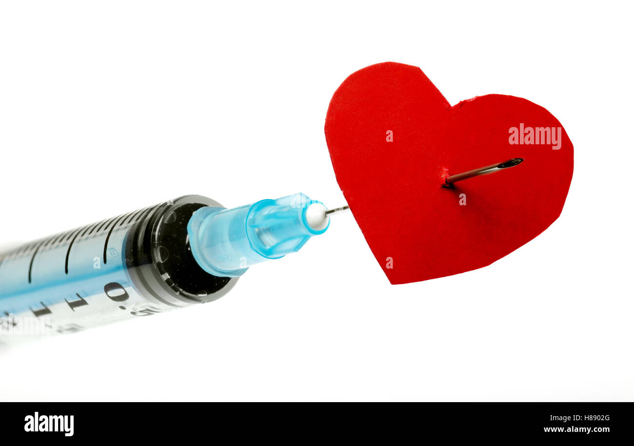 paper heart on a needle of syringe Stock Photo - Alamy
